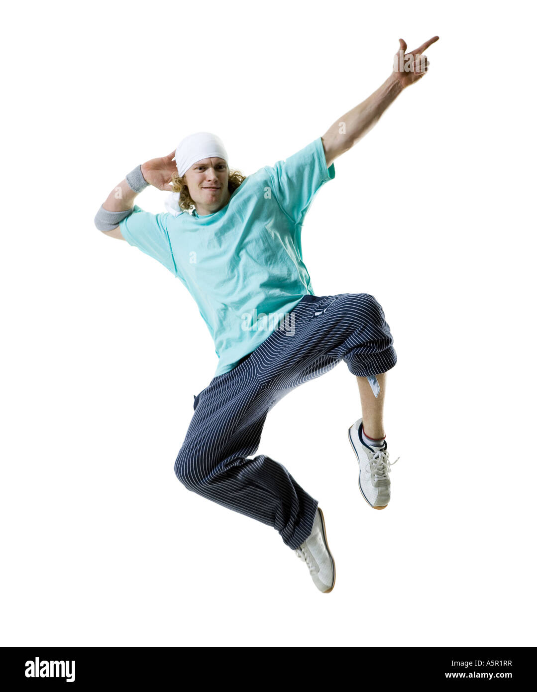 Portrait of a young man jumping Stock Photo - Alamy