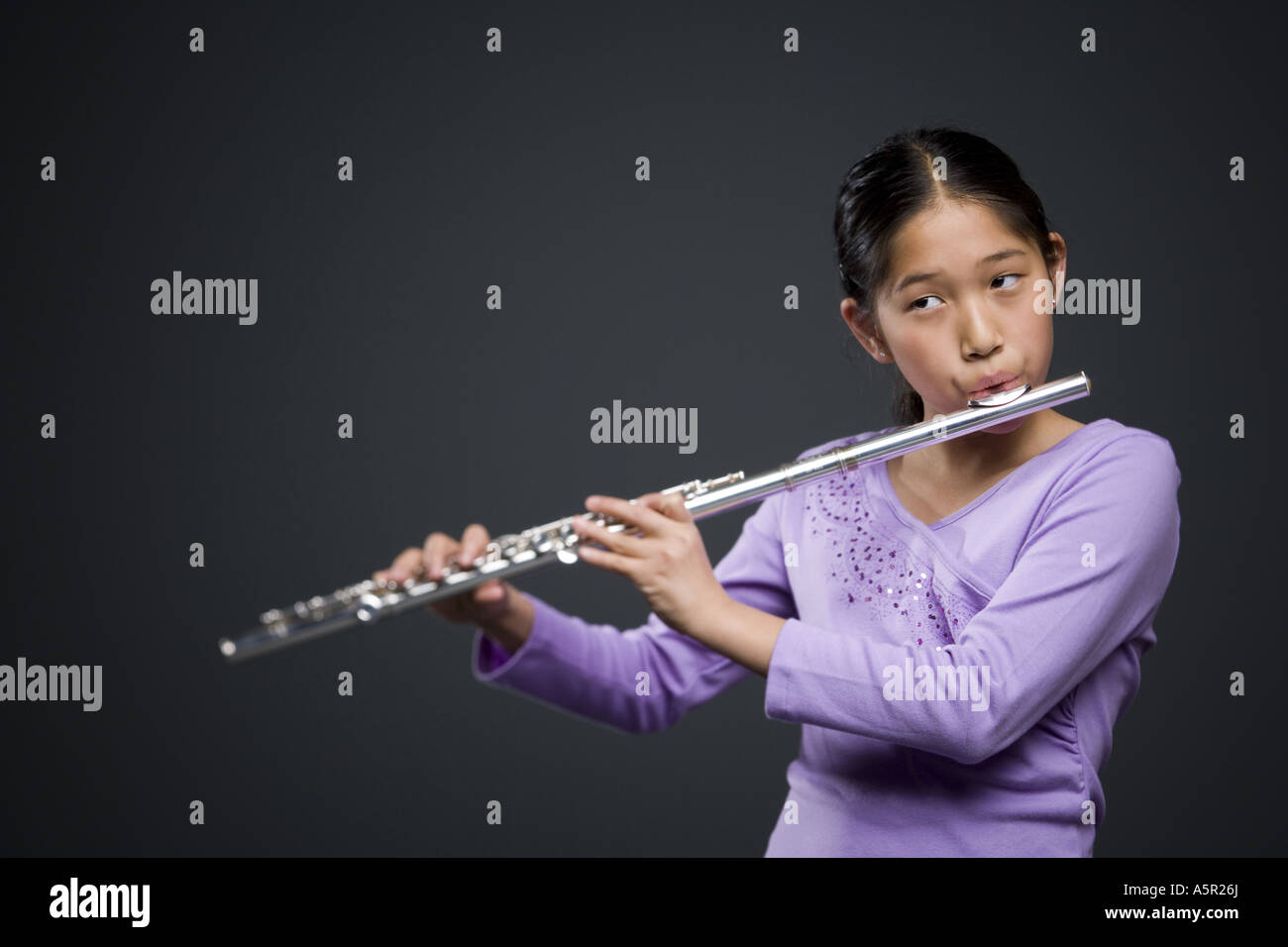 Teenager learning flute hi-res stock photography and images - Alamy