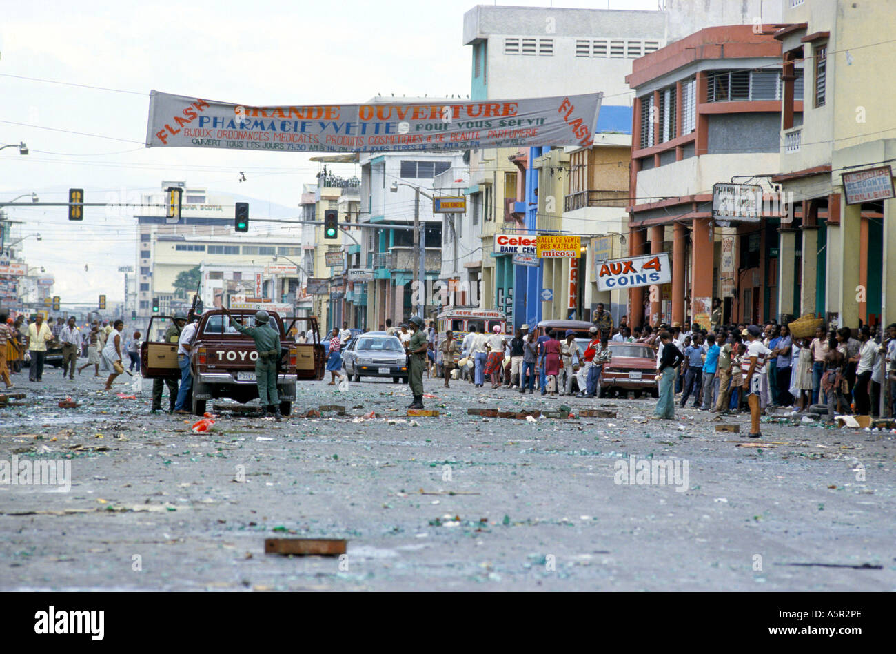 DOWNFALL OF DUVALIER SOLDIERS PEOPLE IN STREET COVERED WITH DEBRIS IN ...