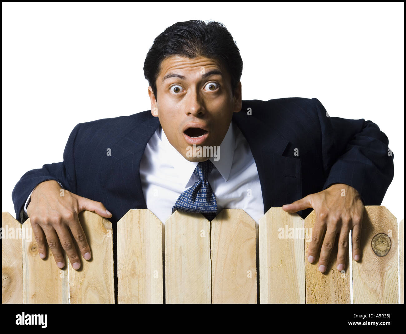 Man spying fence hi-res stock photography and images - Alamy