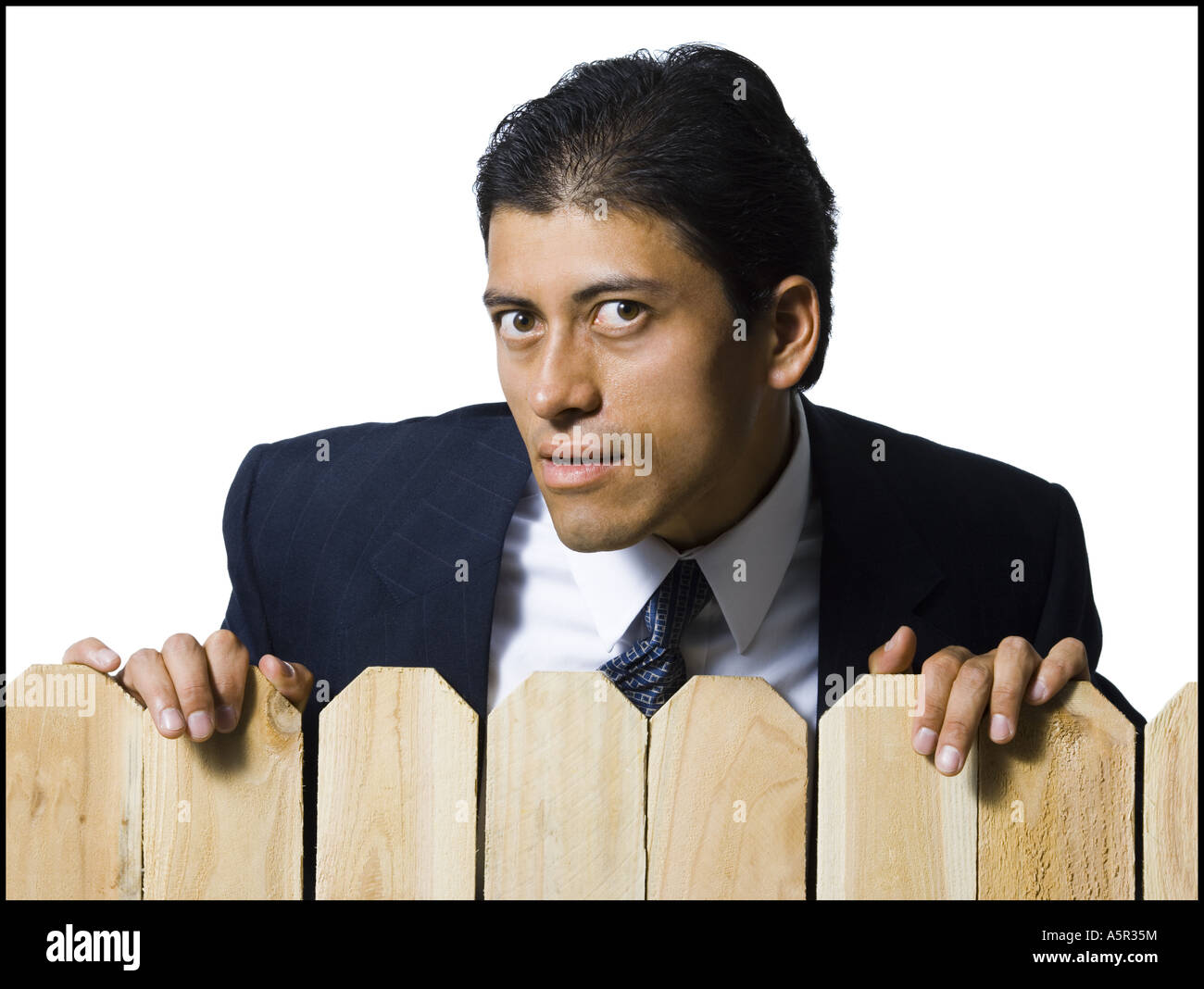 Man spying over fence hi-res stock photography and images - Alamy