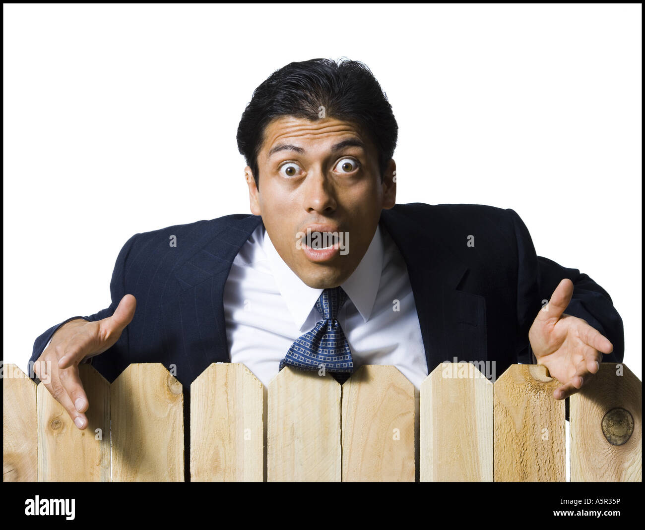 Man spying fence hi-res stock photography and images - Alamy