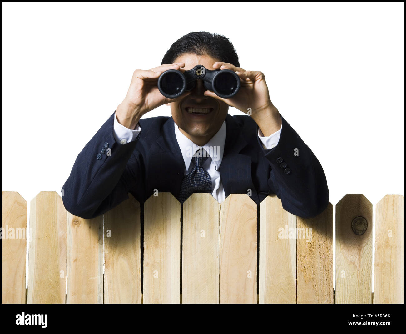 Man spying over fence hi-res stock photography and images - Alamy