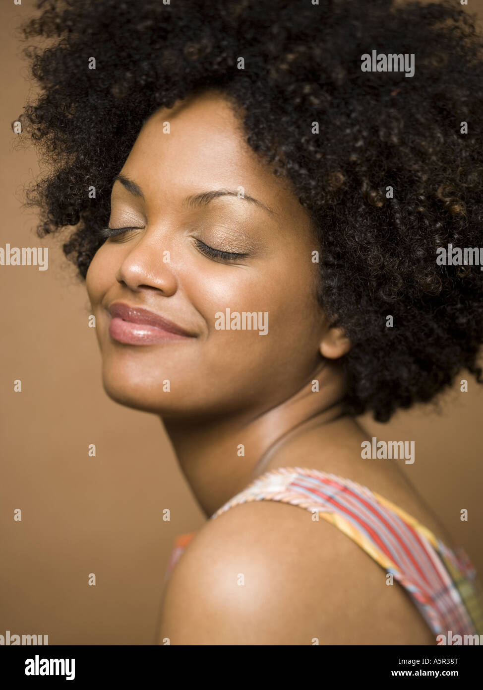 Profile of a young woman day dreaming Stock Photo - Alamy