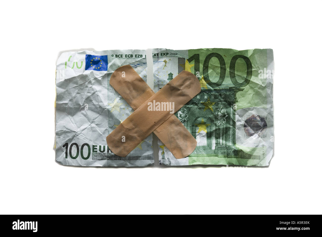 Torn one hundred euro banknote with bandages Stock Photo - Alamy