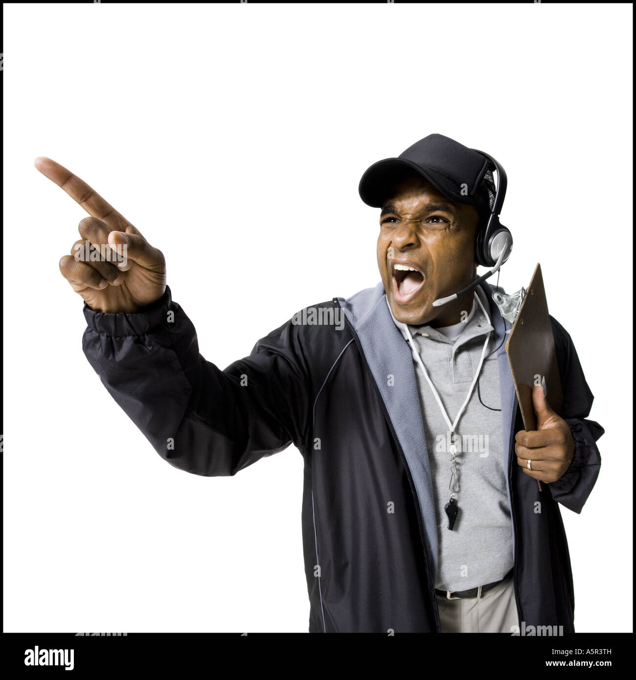 Coach shouting and pointing Stock Photo - Alamy