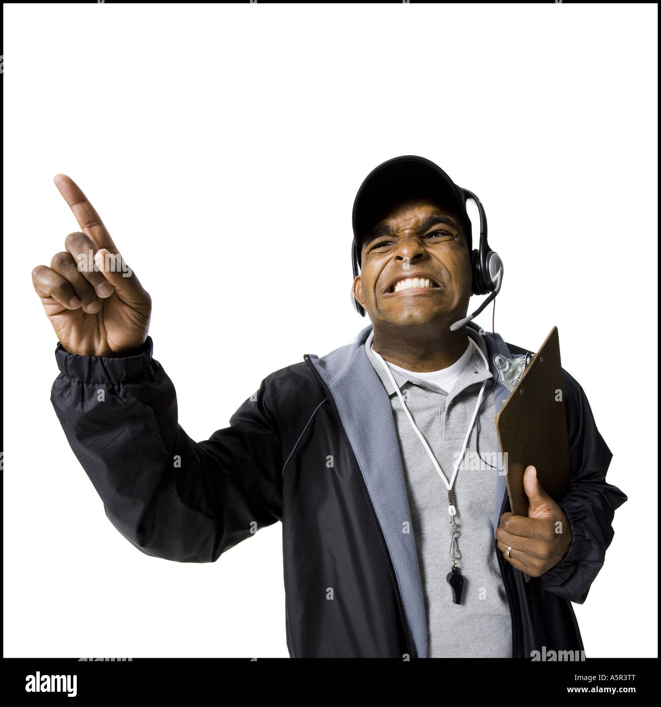 Coach shouting and pointing Stock Photo - Alamy