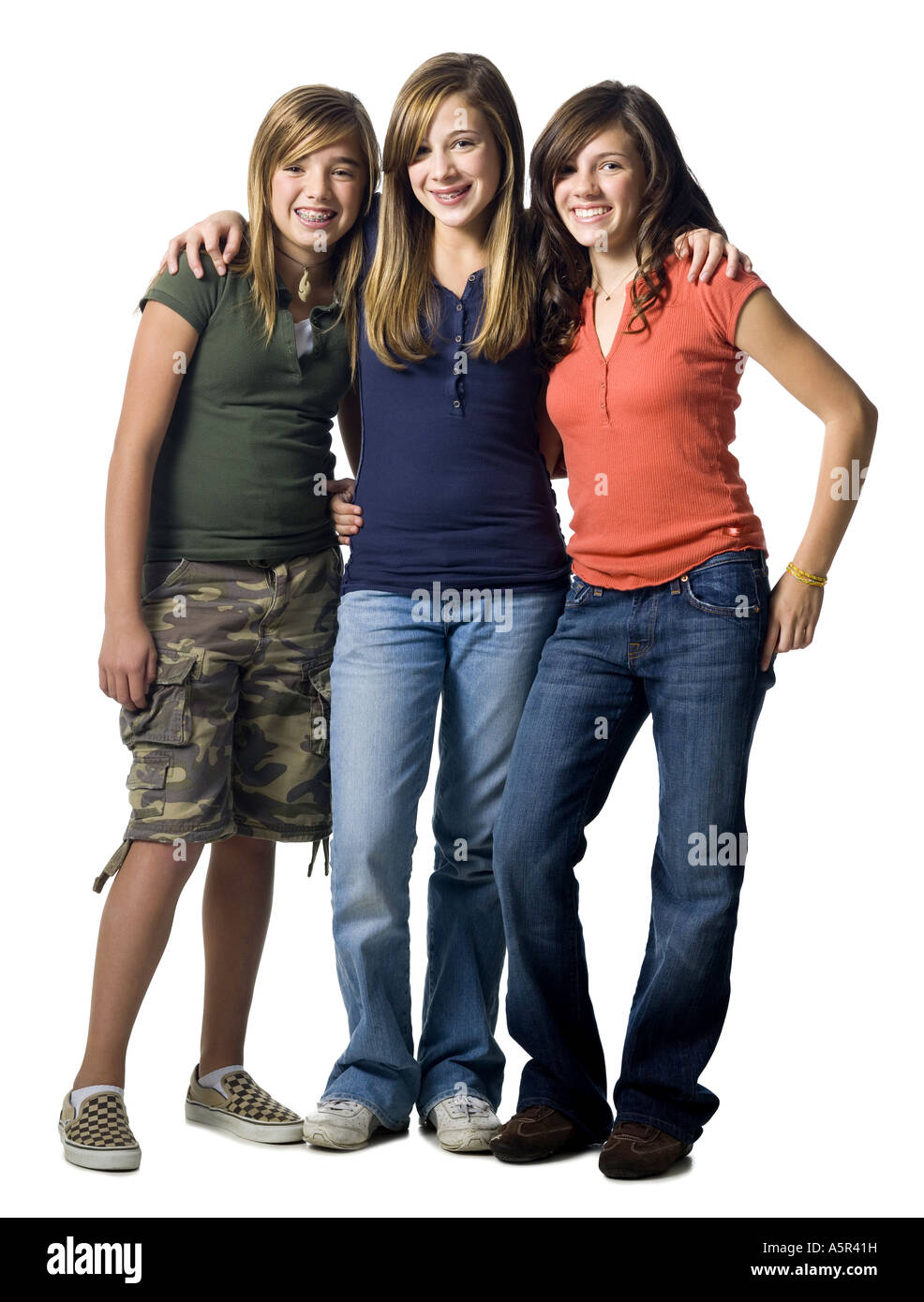 Three girls smiling Stock Photo - Alamy