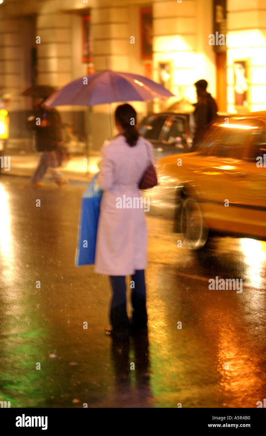 Waiting for a taxi night time hi-res stock photography and images - Alamy
