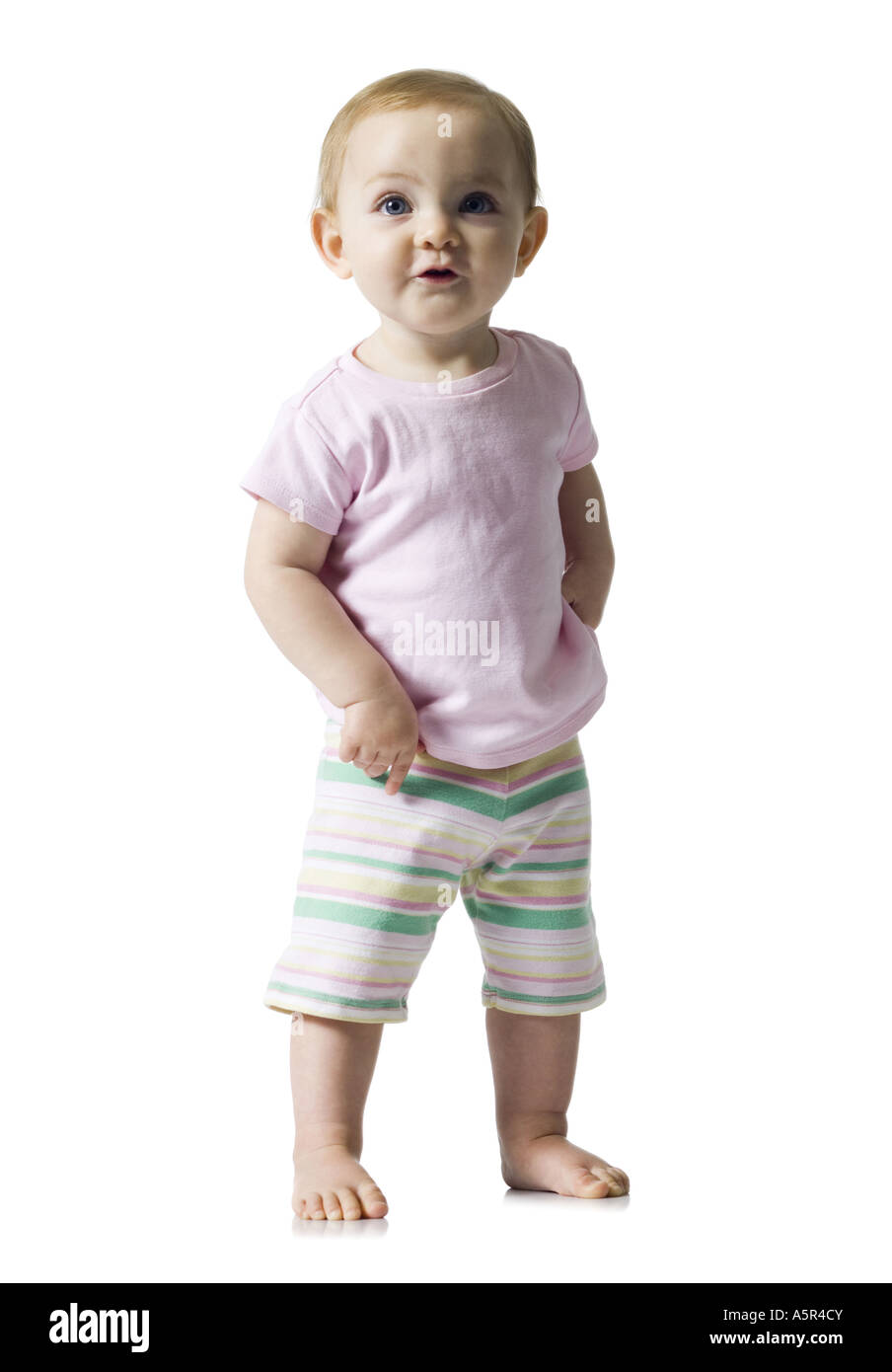 Baby Girl standing Stock Photo - Alamy