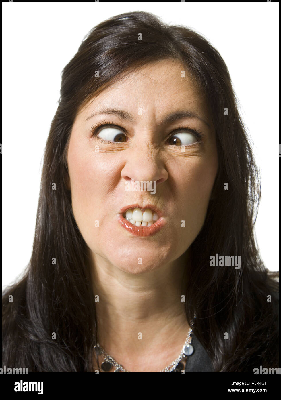 Closeup of woman with crossed eyes making funny face Stock Photo - Alamy