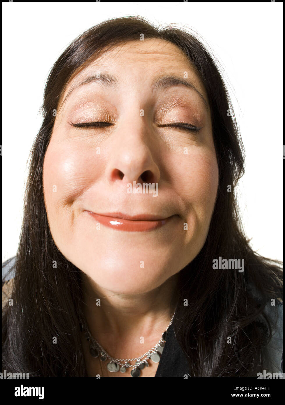 Closeup of woman with funny face eyes closed Stock Photo - Alamy