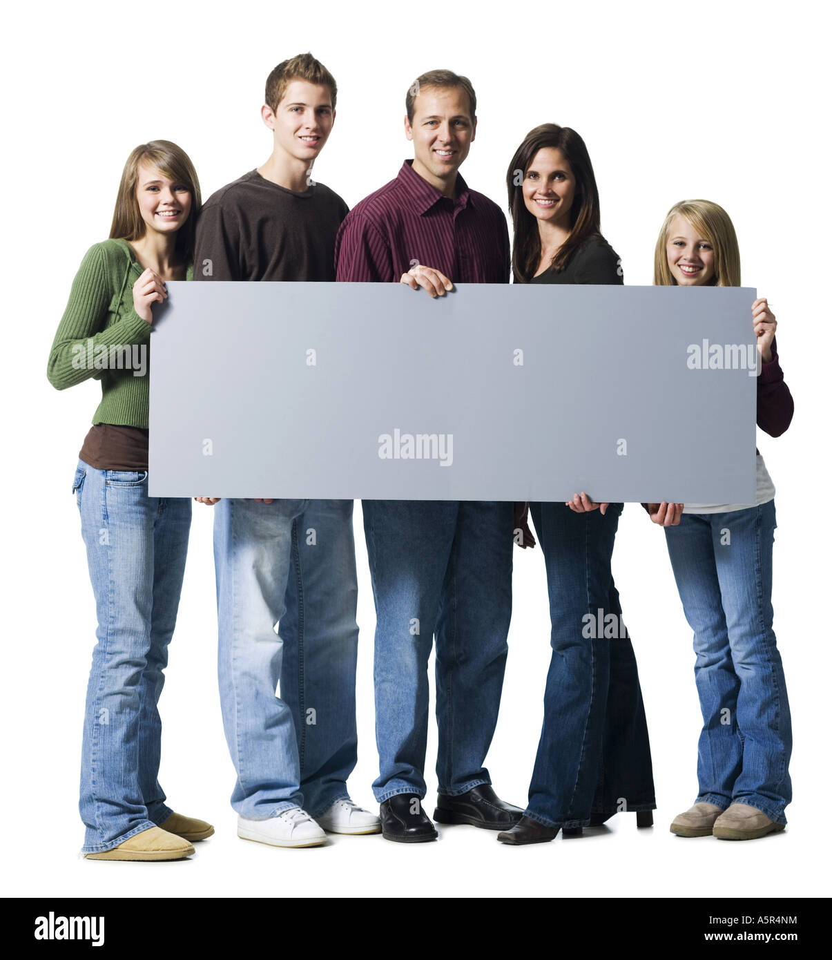Family of five holding blank sign Stock Photo - Alamy