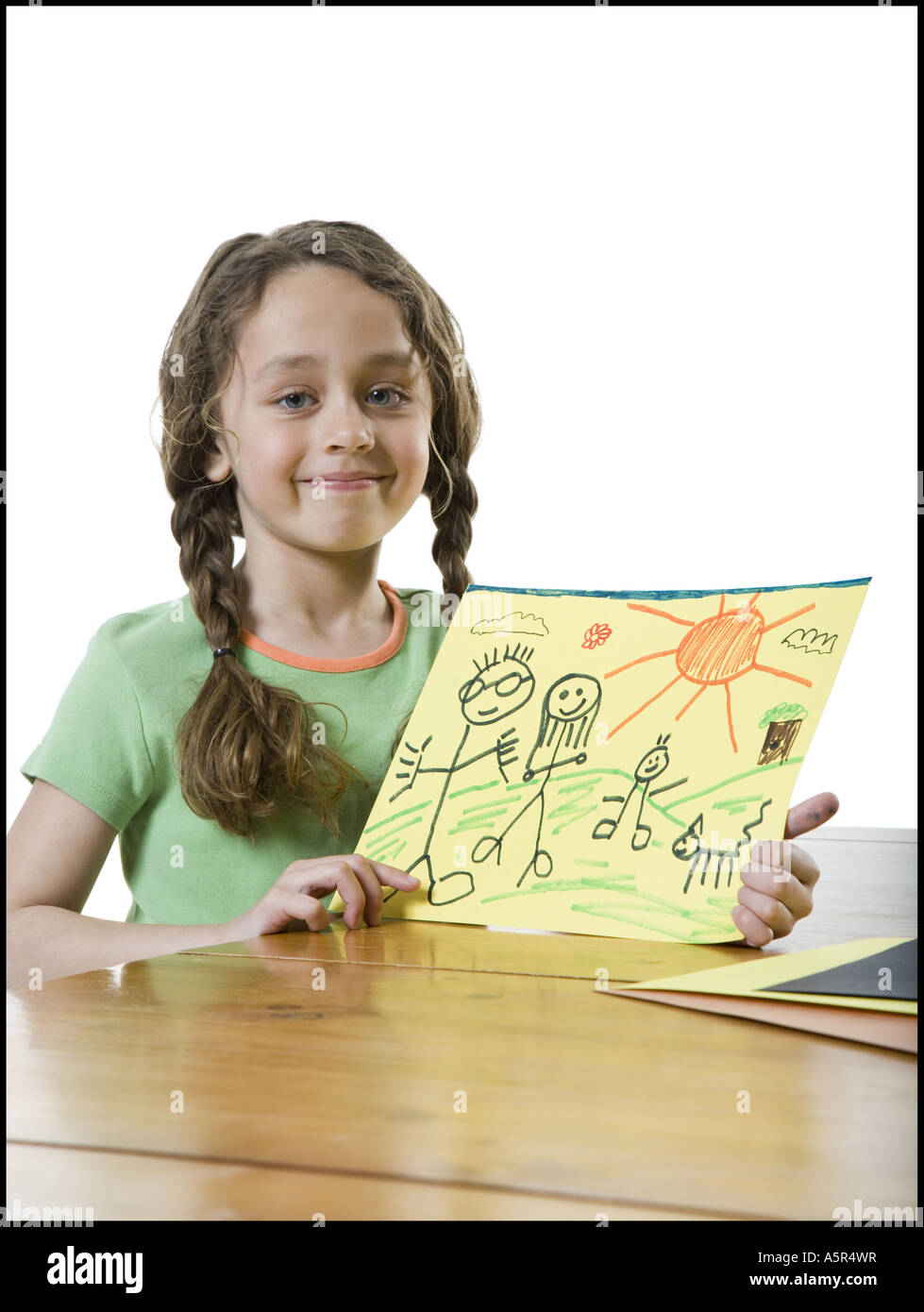 Portrait of a girl showing a drawing Stock Photo - Alamy