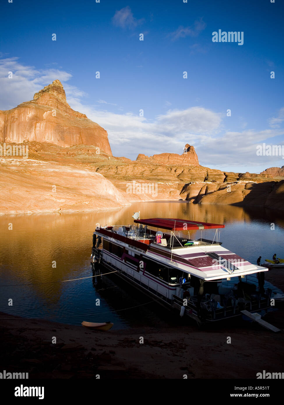 Large boat on water with rock formations Stock Photo - Alamy