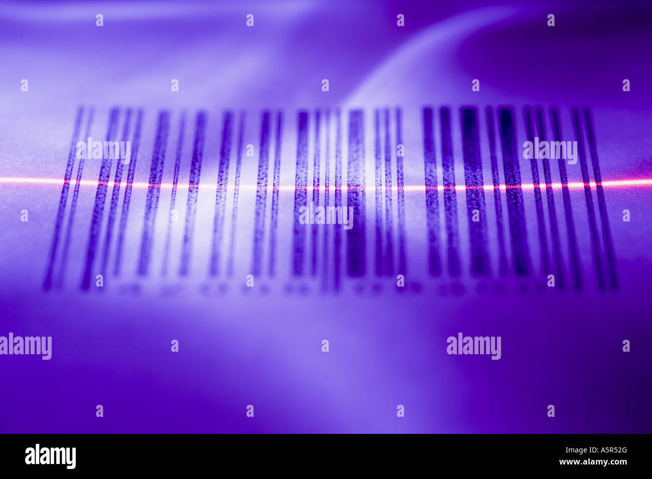 Close up of a bar code being scanned with a laser light Stock Photo - Alamy
