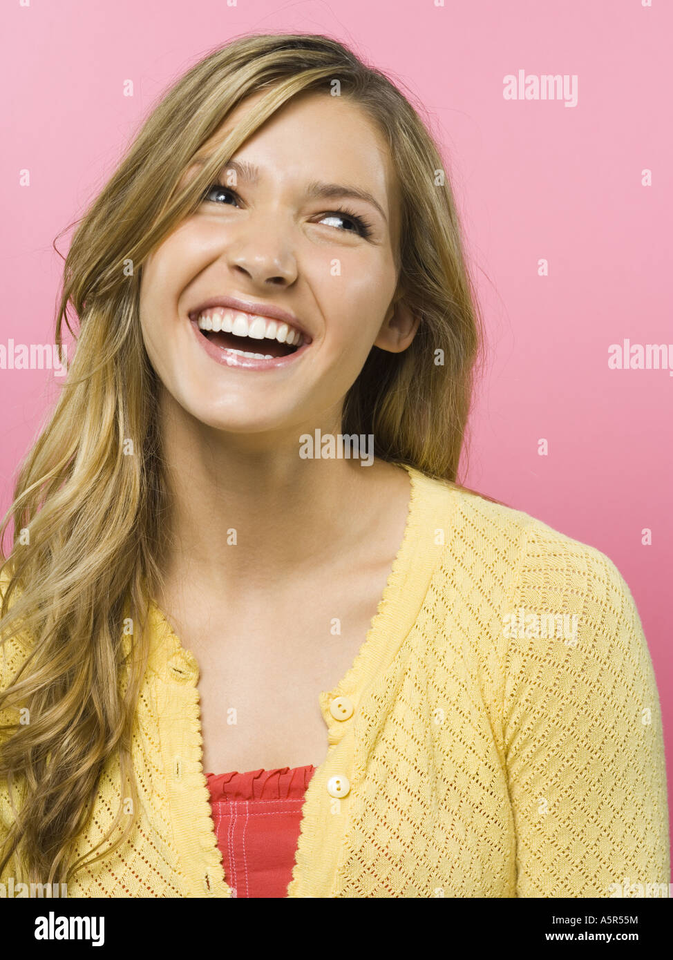 Portrait of a woman smiling looking up Stock Photo - Alamy
