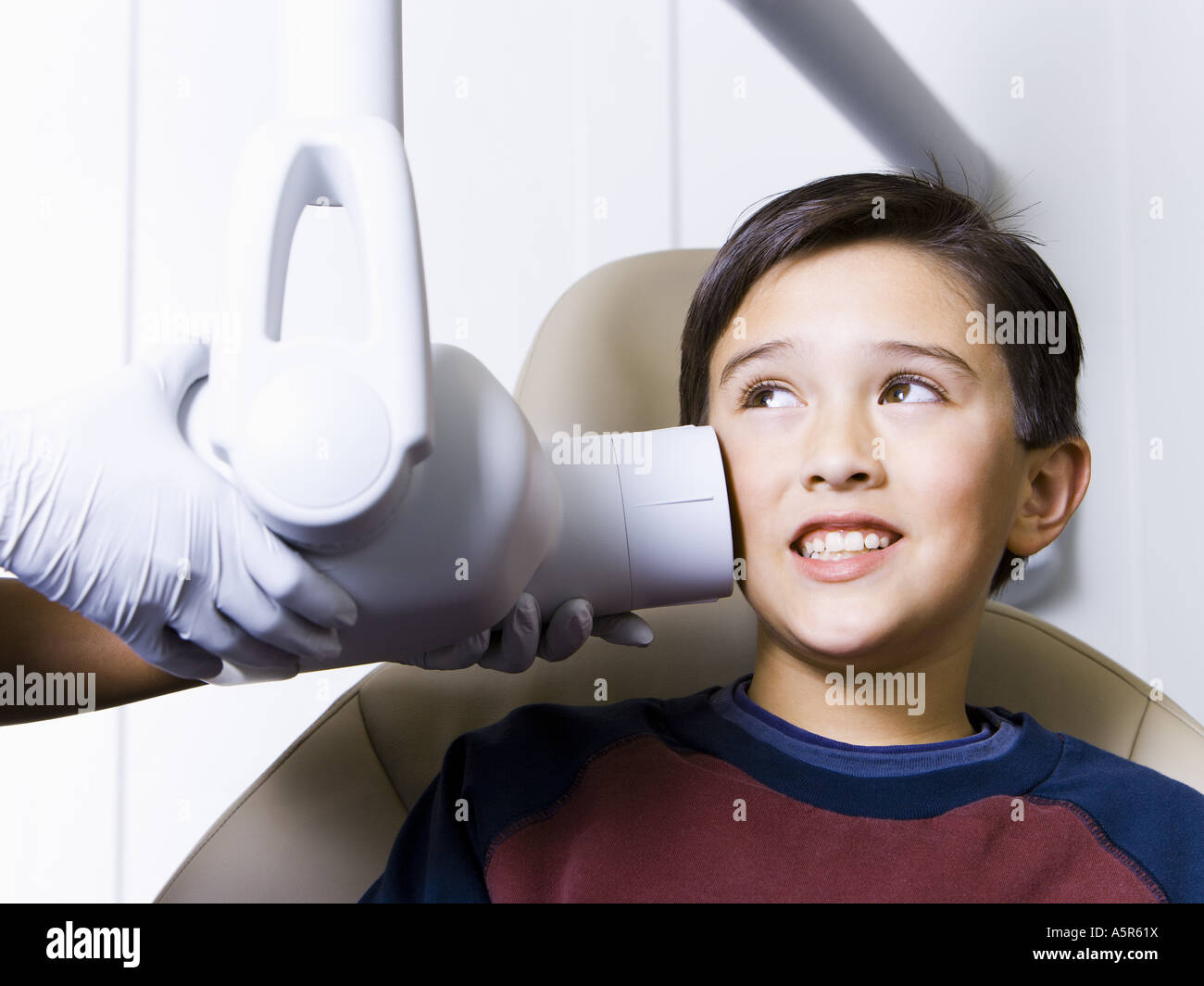 Boy having dental x rays Stock Photo - Alamy
