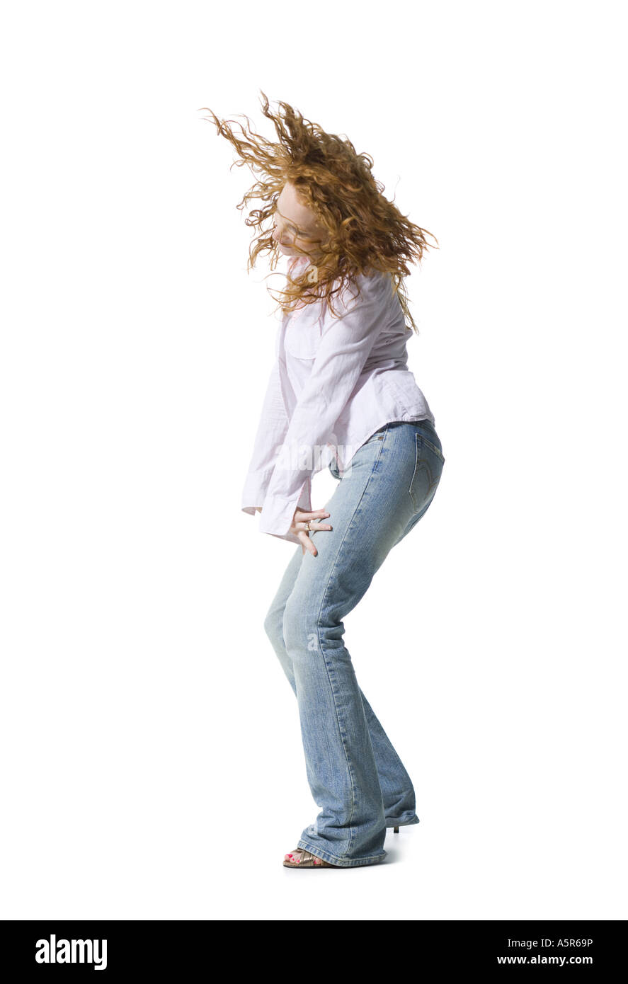 Profile of a young woman dancing Stock Photo - Alamy