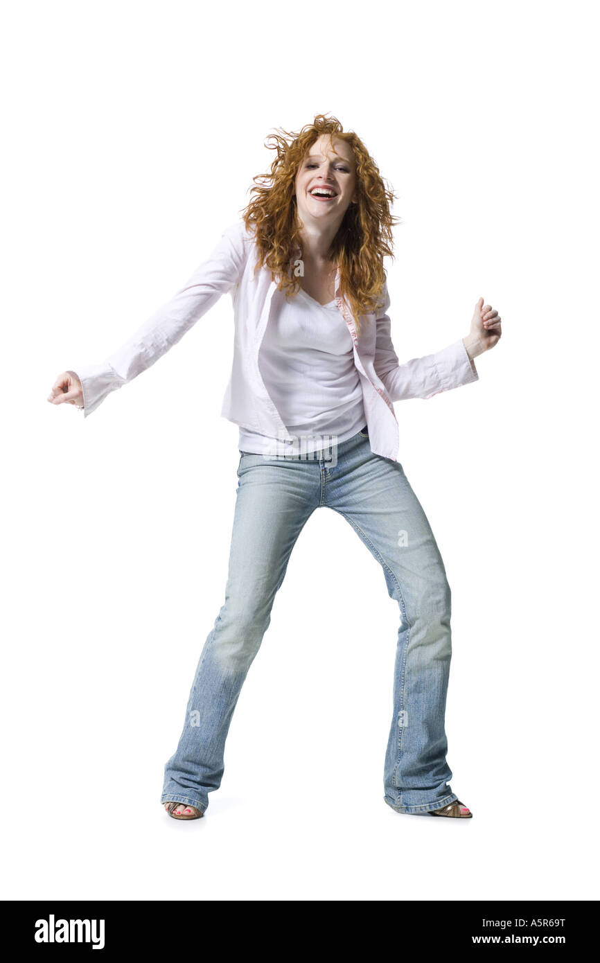 Portrait of a young woman dancing Stock Photo - Alamy