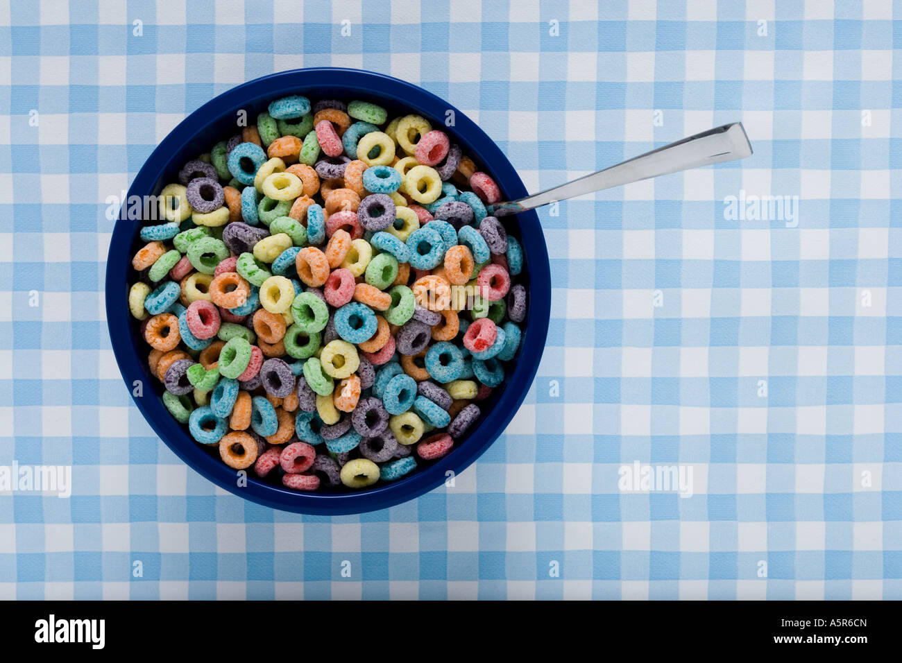Bowl of cereal with spoon Stock Photo - Alamy