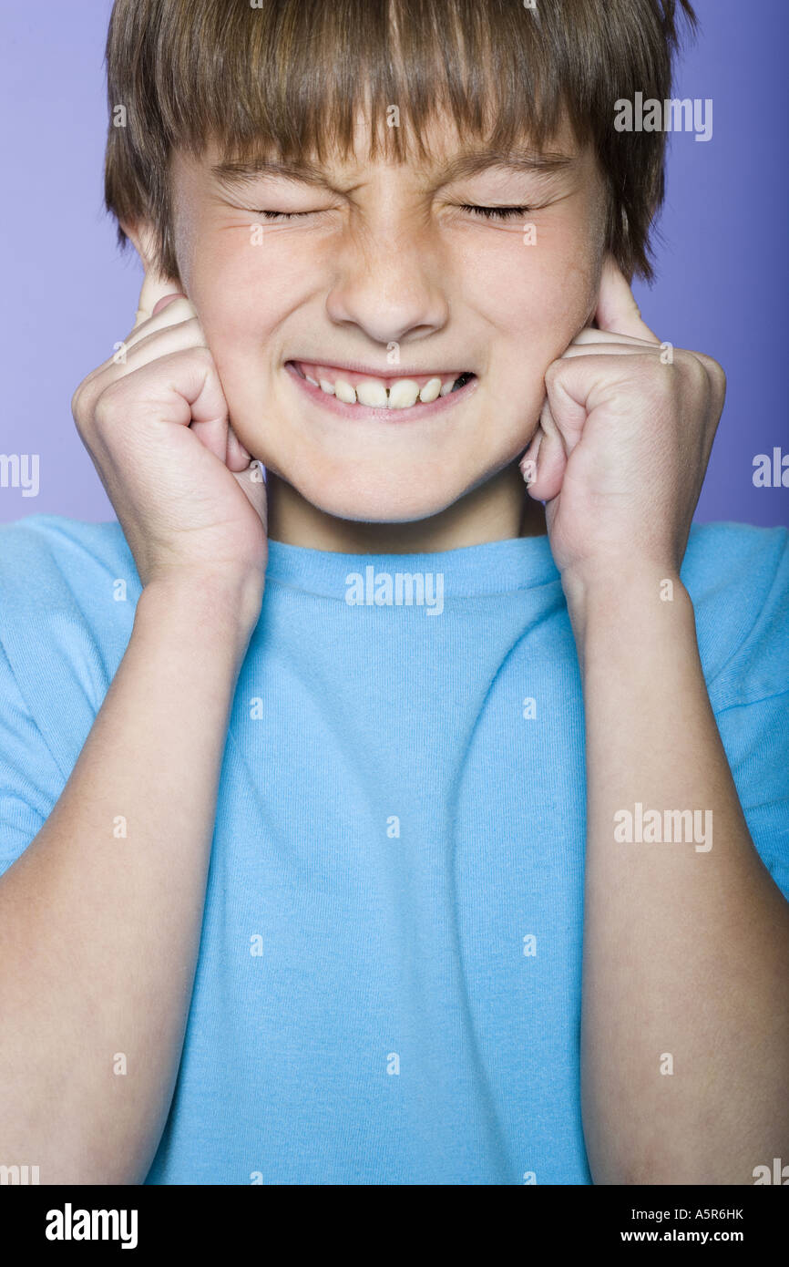 Close up of a boy making a face Stock Photo - Alamy