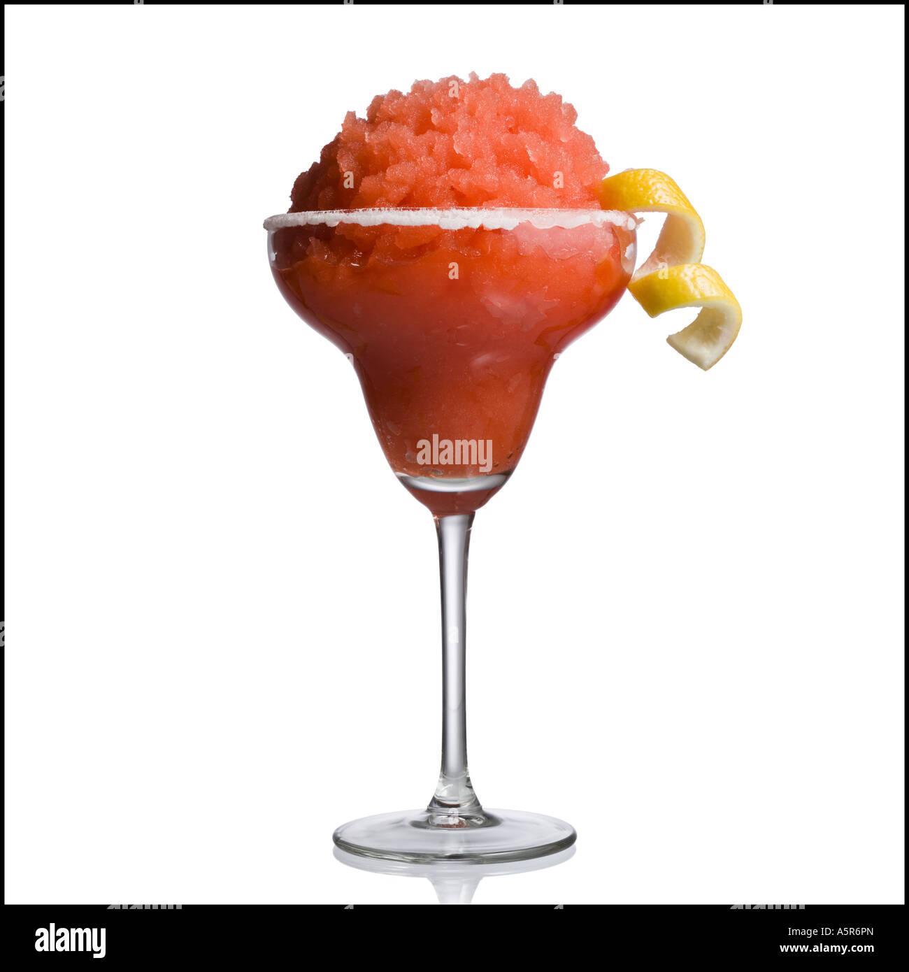 Red slush beverage in cocktail glass with lemon garnish Stock Photo - Alamy