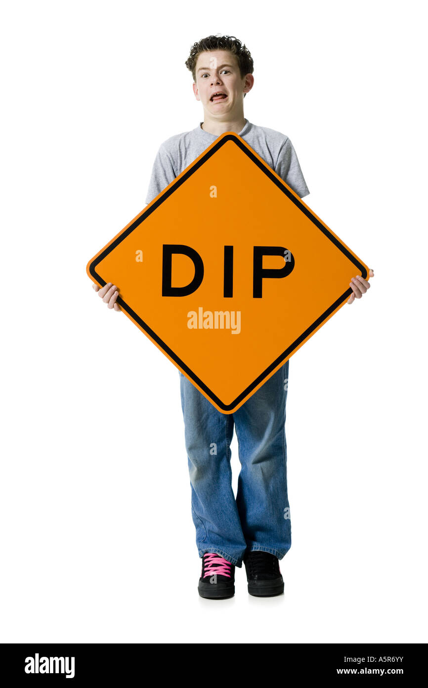 Portrait of a teenage boy holding a sign board Stock Photo - Alamy