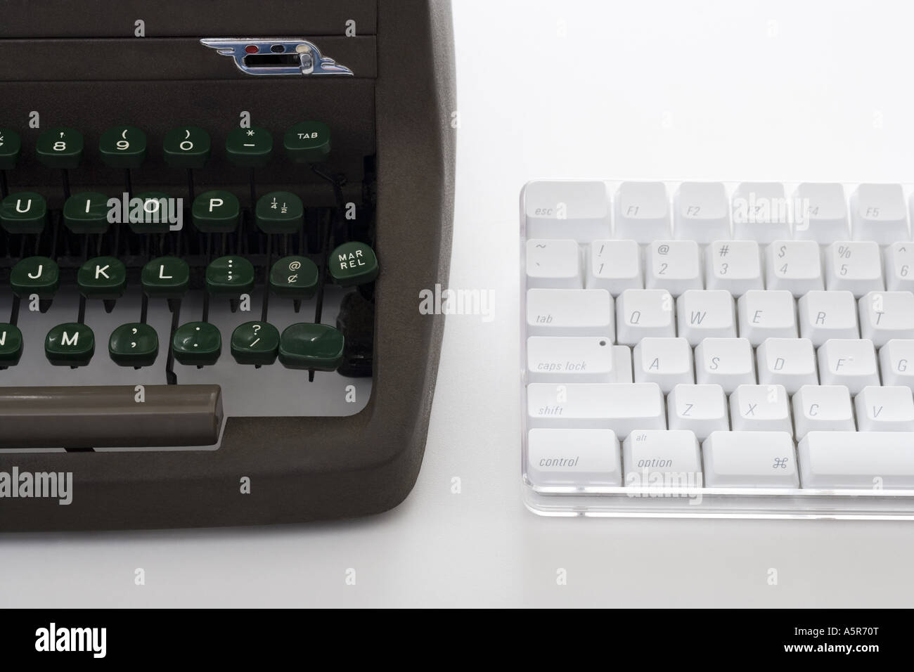 Old typewriter and modern keyboard Stock Photo - Alamy