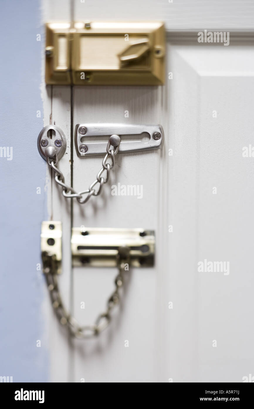 Three locks on door Stock Photo - Alamy