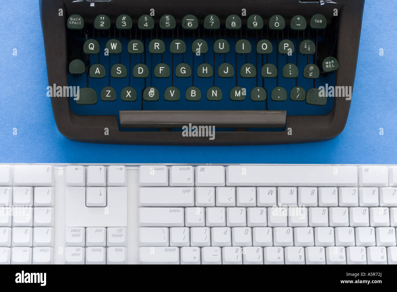 Old typewriter and modern keyboard Stock Photo - Alamy