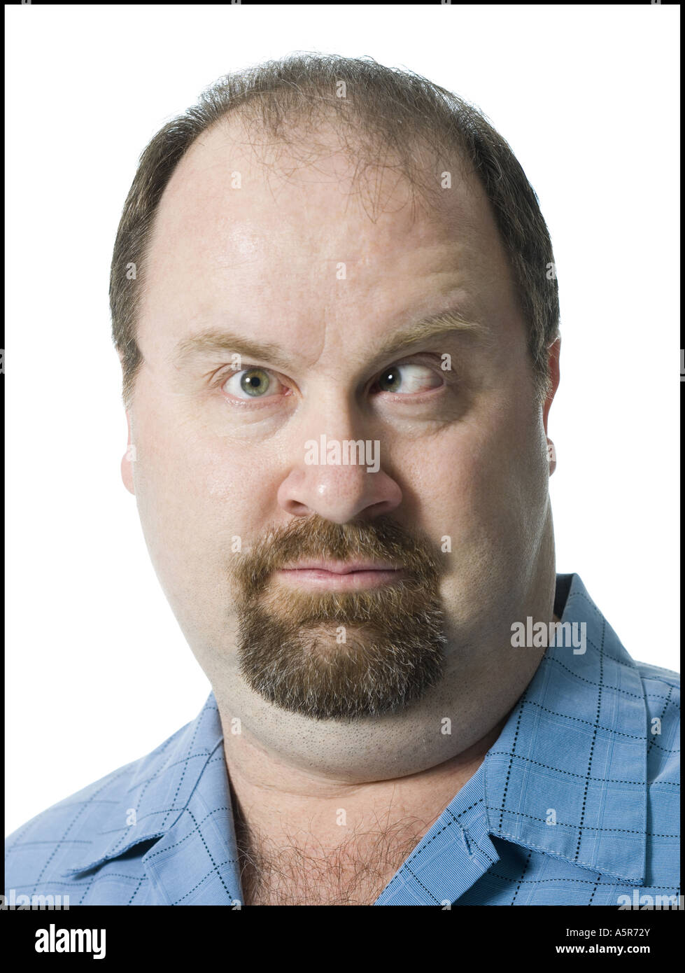 Portrait of a mature man looking worried Stock Photo - Alamy