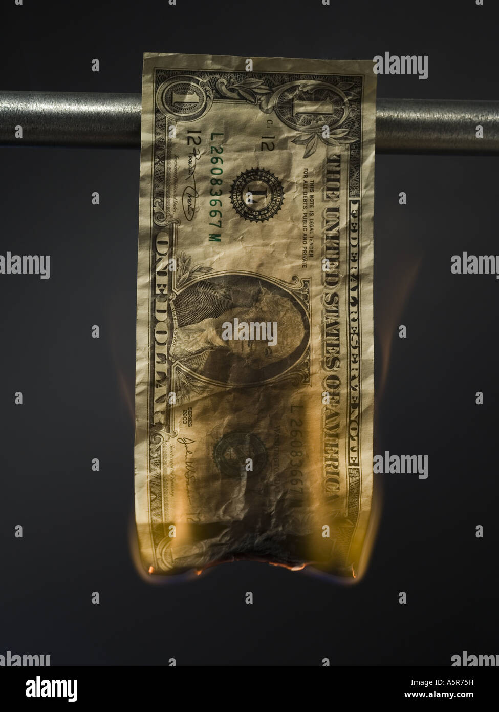 United States one dollar bill on fire Stock Photo - Alamy