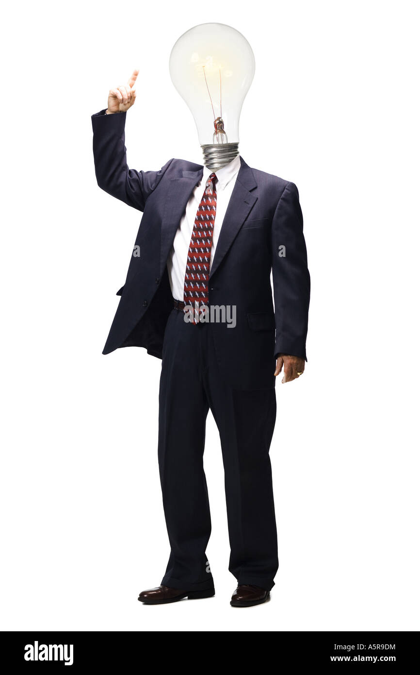 Businessman pointing to light bulb on head Stock Photo - Alamy