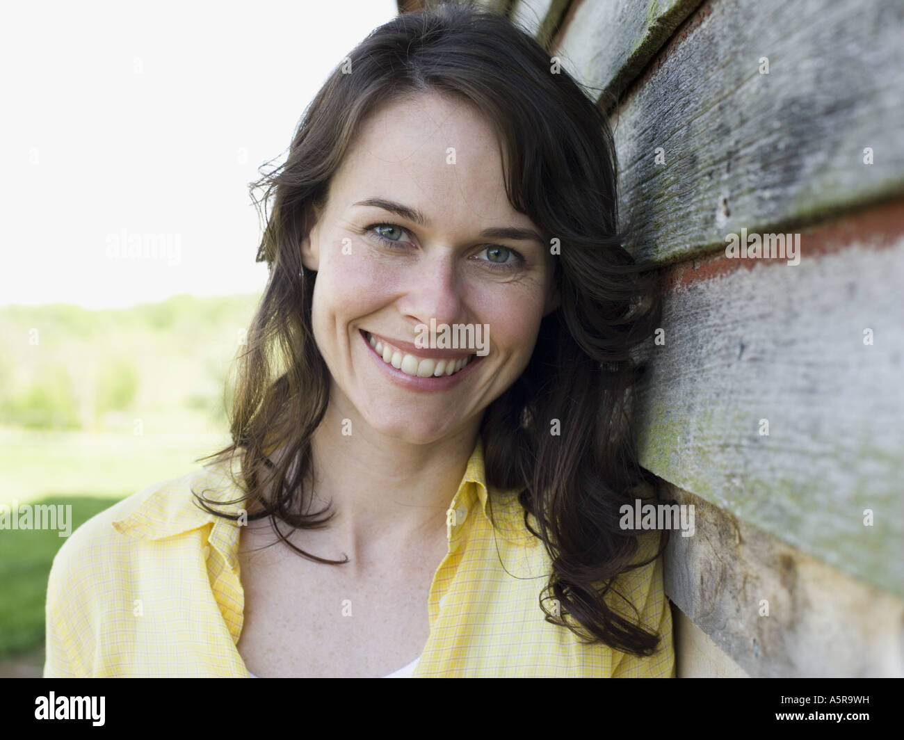 Portrait of a woman smiling Stock Photo - Alamy
