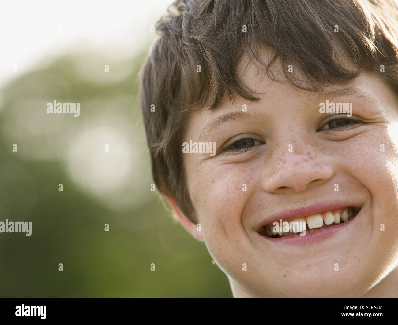 Portrait of a boy smiling Stock Photo - Alamy