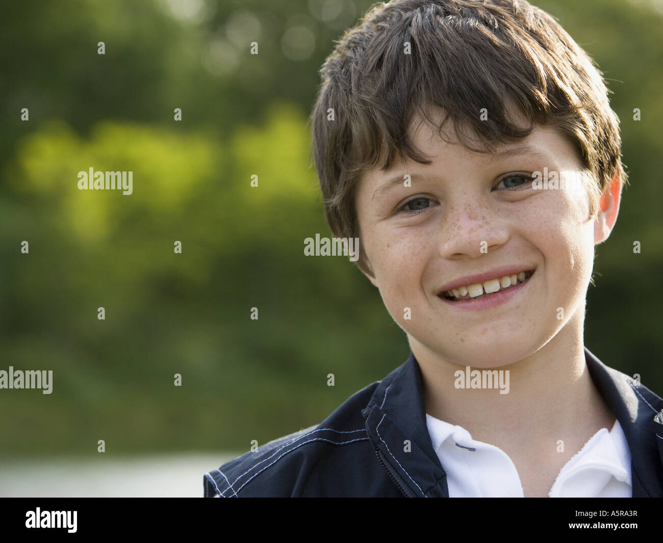 Portrait of a boy smiling Stock Photo - Alamy