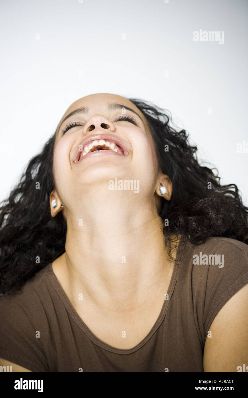Portrait of a woman laughing and leaning back Stock Photo - Alamy