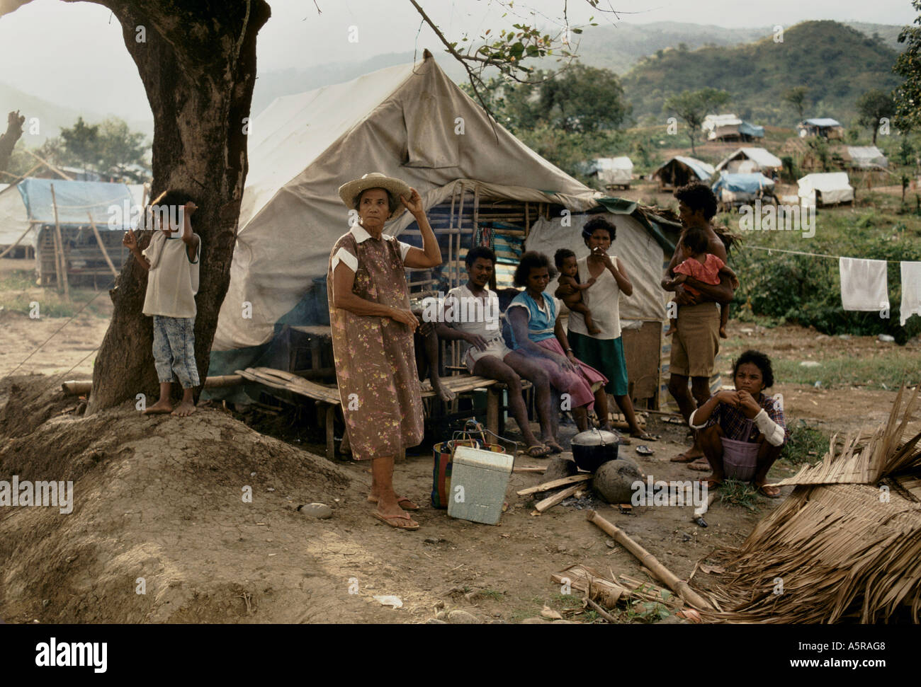 MOUNT PINATUBO DISASTER: SCENE OF AN AETA FAMILY IN FRONT OF THEIR TENT ...