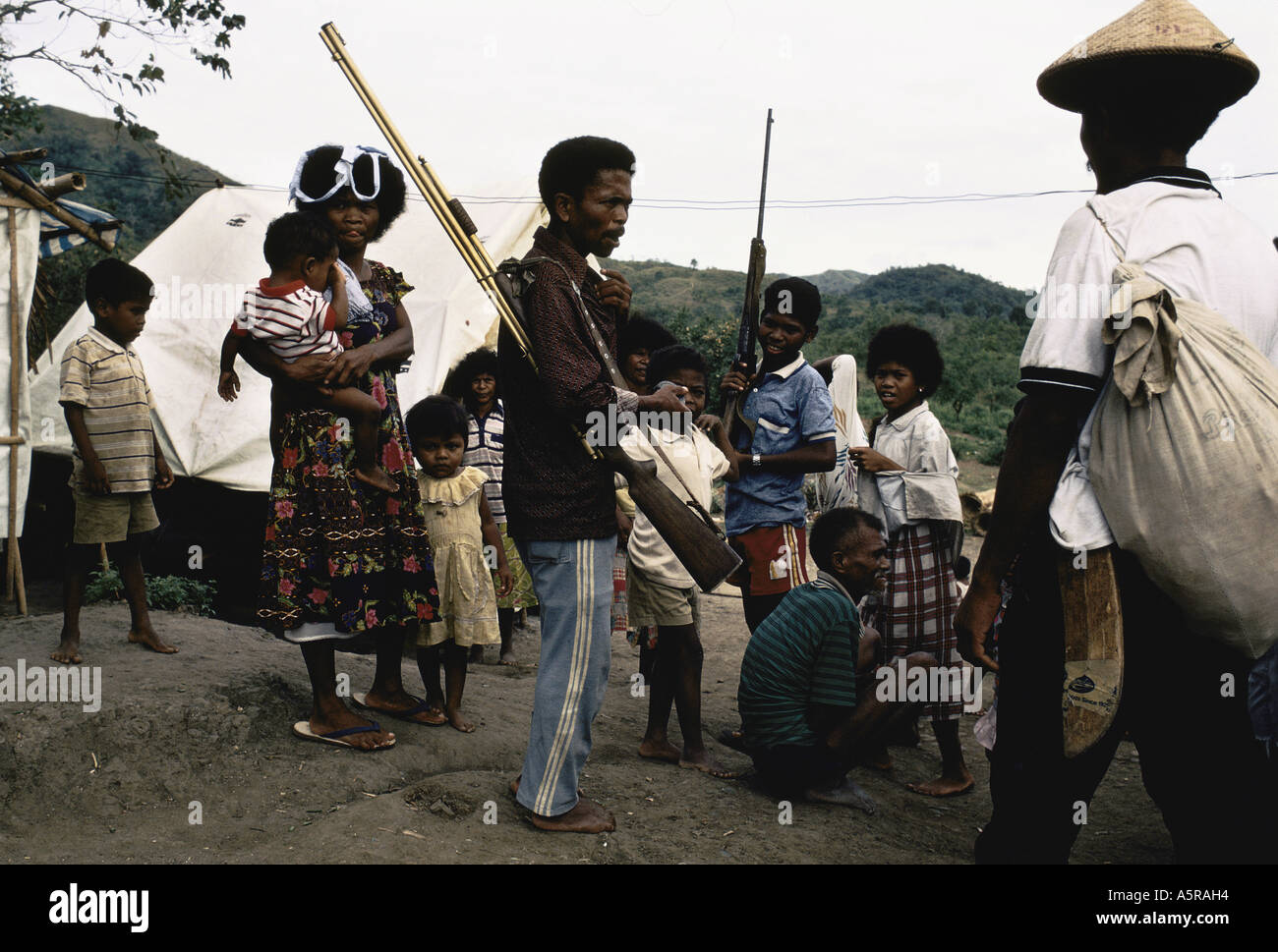 MOUNT PINATUBO DISASTER FEBRUARY 1991 MALE AETAS GET READY TO LEAVE ...
