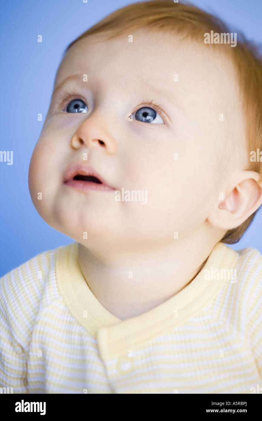 Portrait of a baby looking up Stock Photo - Alamy