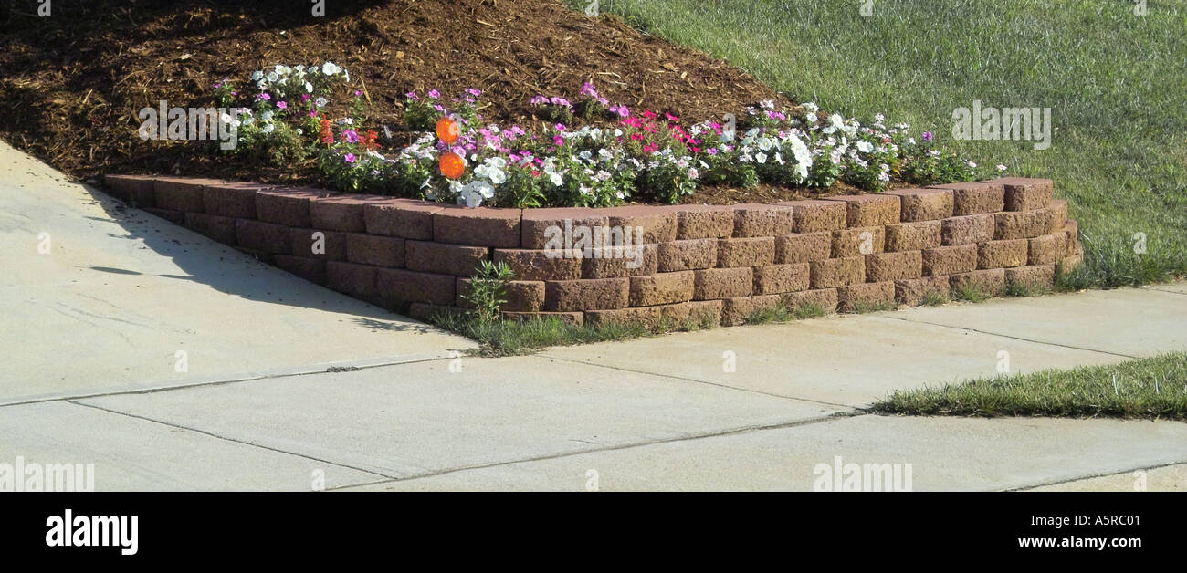 brick flowers landscaping Stock Photo - Alamy
