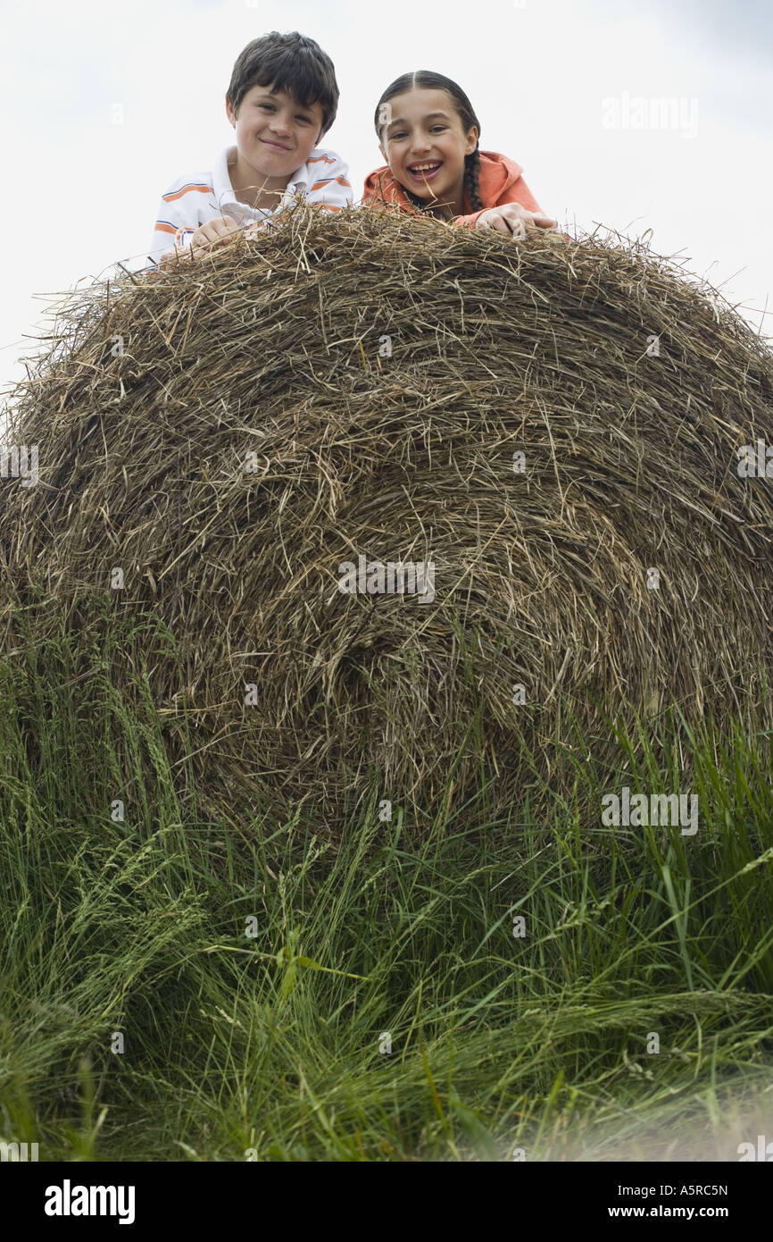 Girl lying on haystack hi-res stock photography and images - Alamy