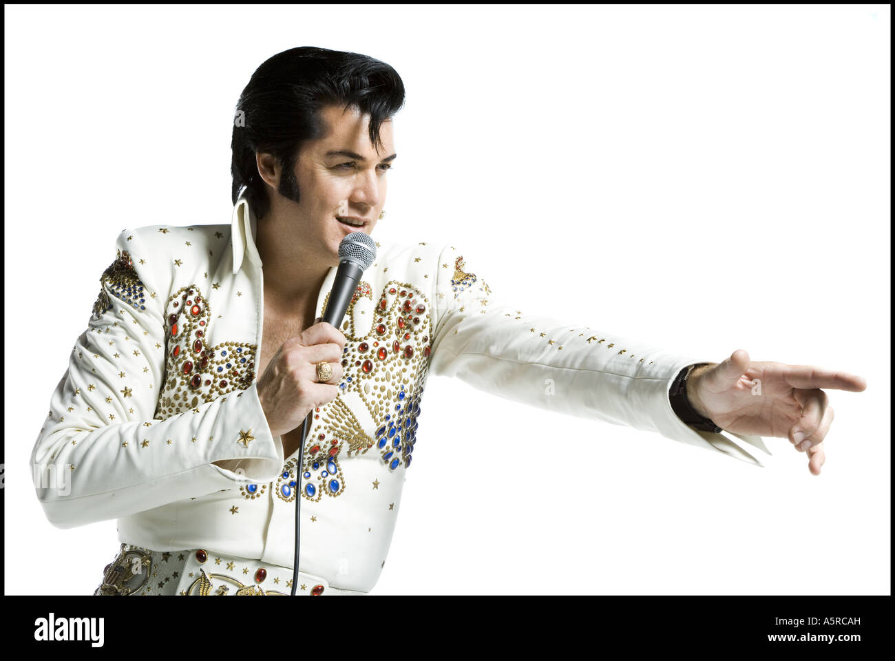 Elvis impersonator singing microphone hi-res stock photography and ...