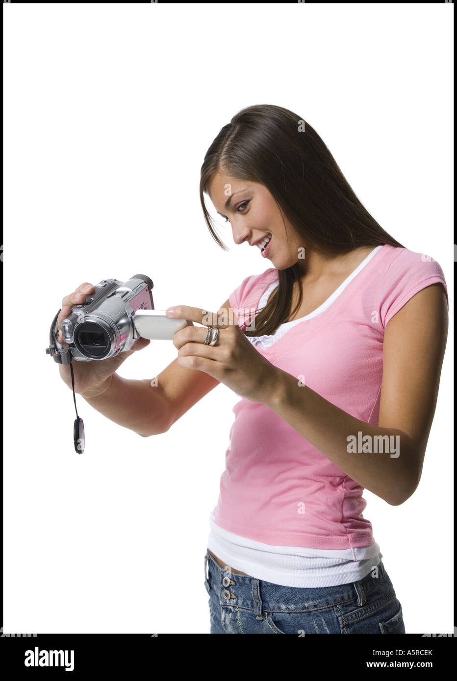 A young woman filming with a home video camera Stock Photo - Alamy