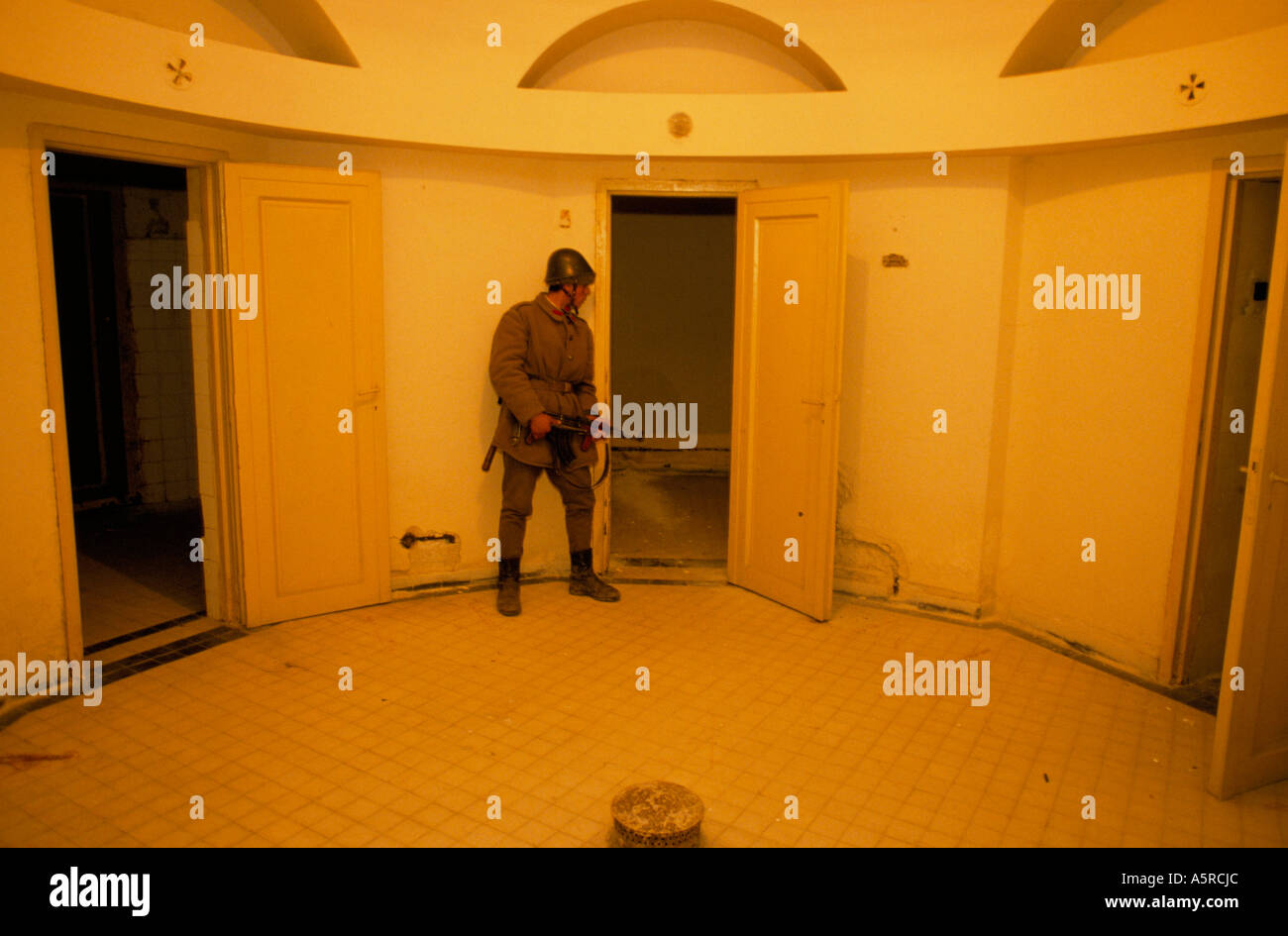 ROMANIA REVOLUTION 1989 SOLDIER PROCEEDS WITH CAUTION AS HE LOOKS INTO ...