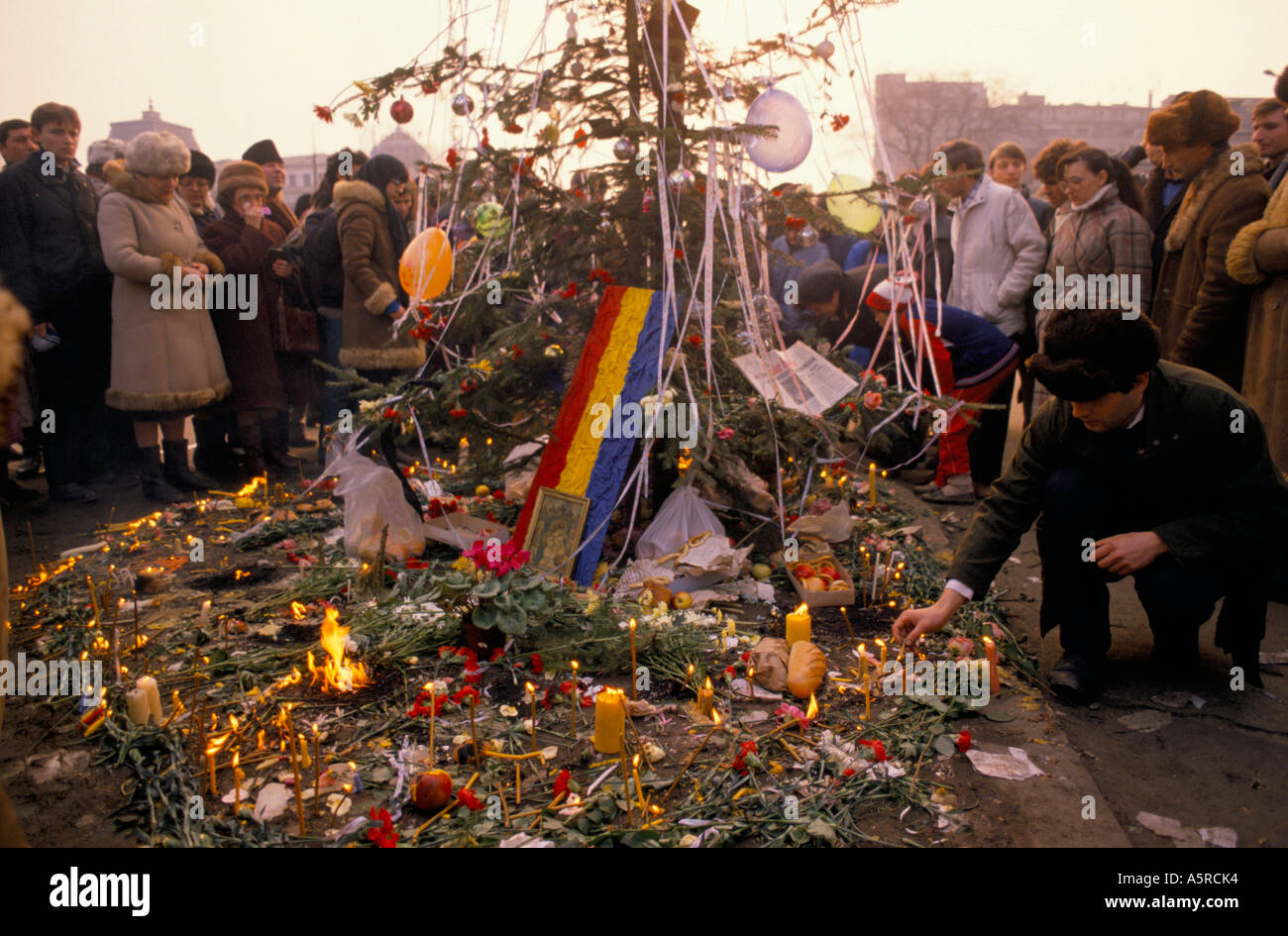 ROMANIAN REVOLUTION 1989 MAN LIGHTING CANDLE ON ROADSIDE SHRINE ...