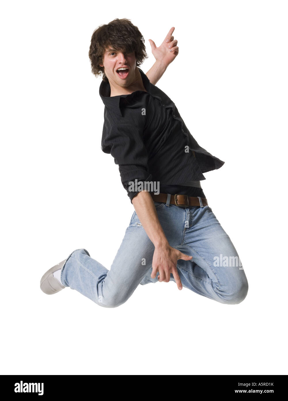 A teenage boy jumping Stock Photo - Alamy