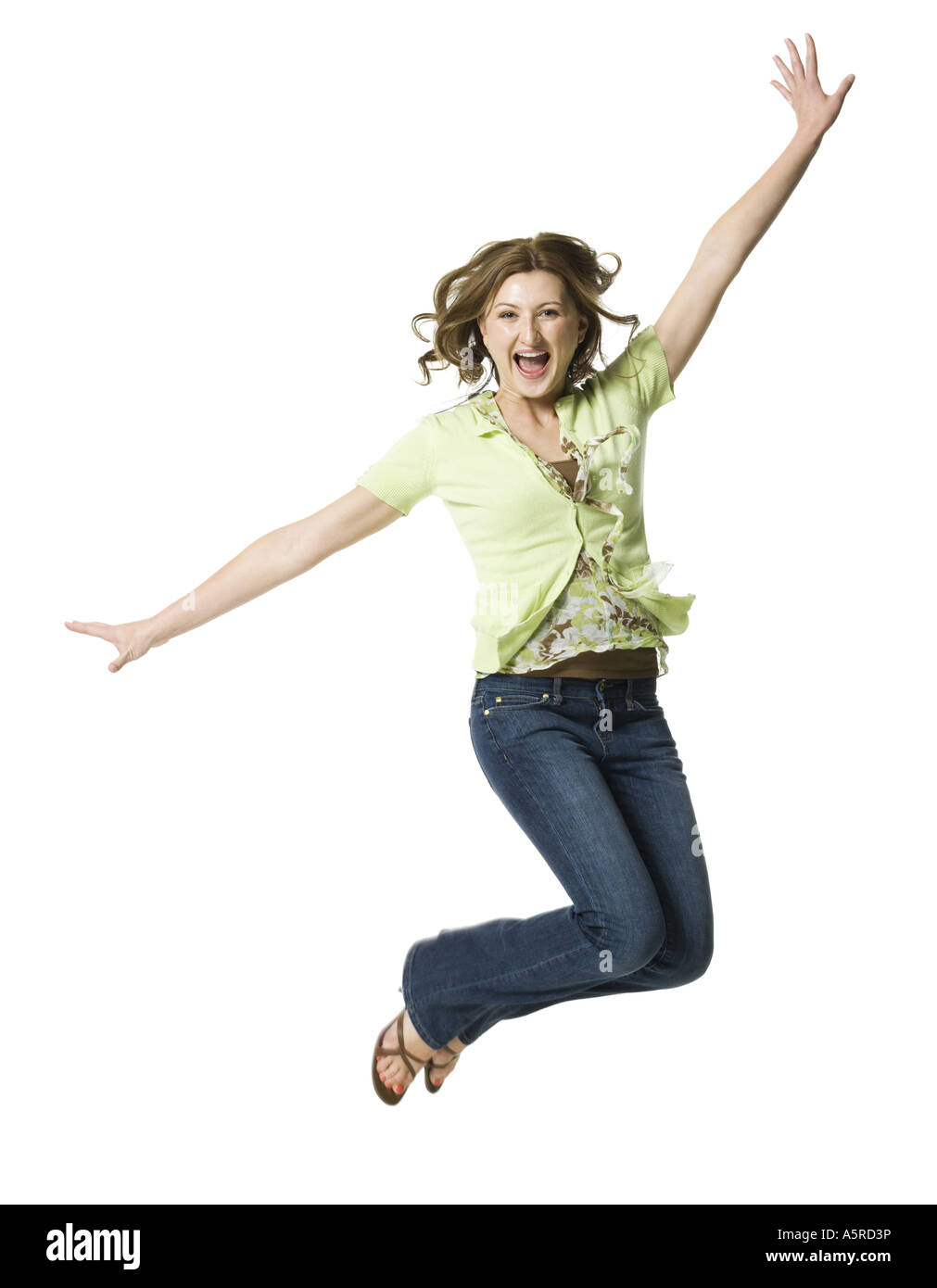 A young woman jumping Stock Photo - Alamy