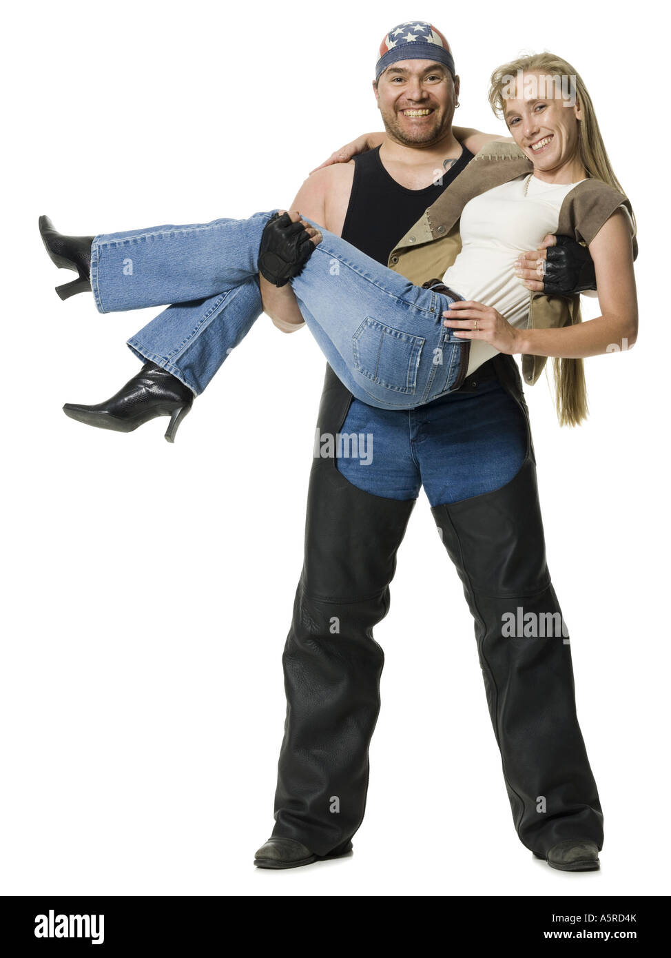 Portrait of a man carrying a young woman Stock Photo - Alamy